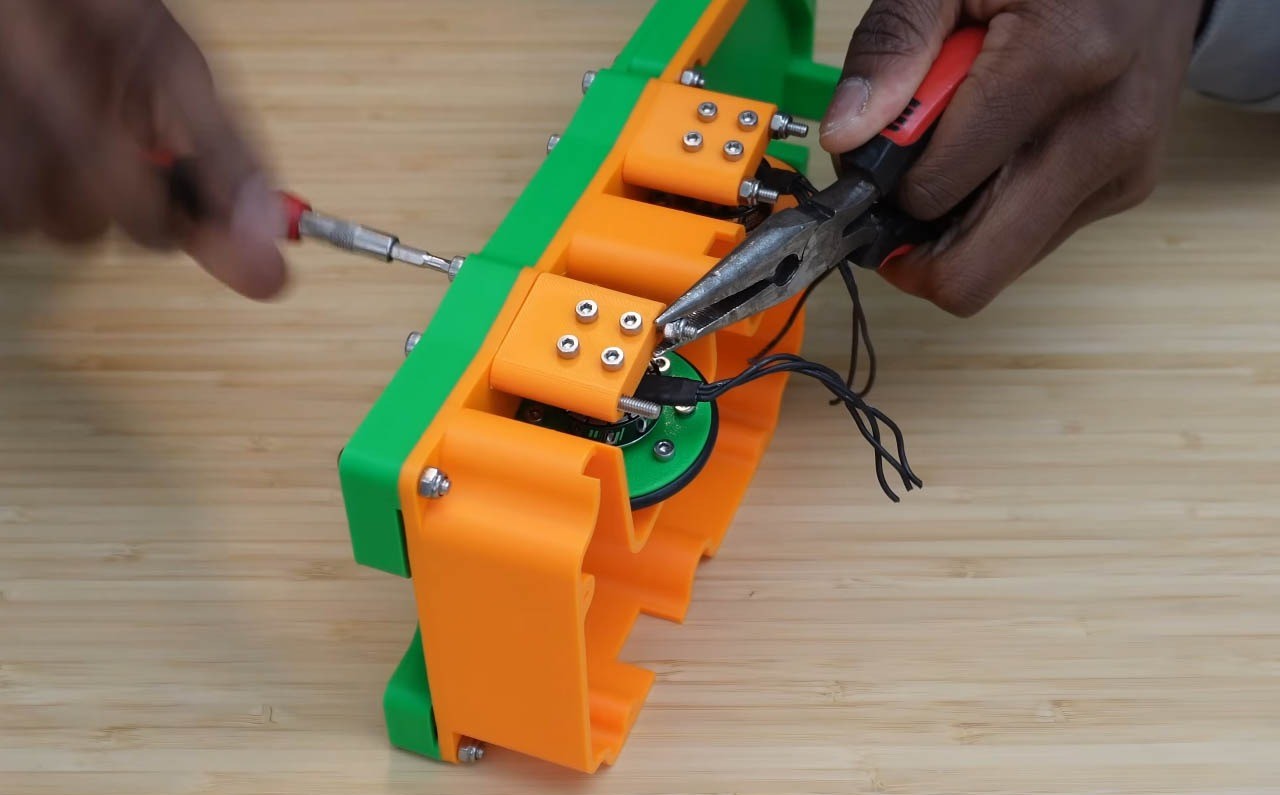 YouTuber Builds Wrist-Mounted CD Launcher That Fires at 33 MPH - Gadget ...